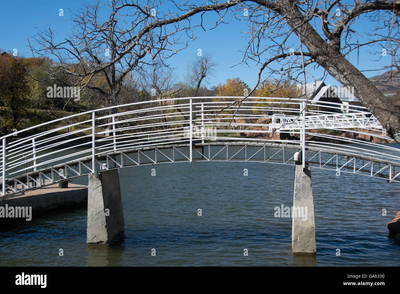 BRidge over a creek Stock Photo - Alamy