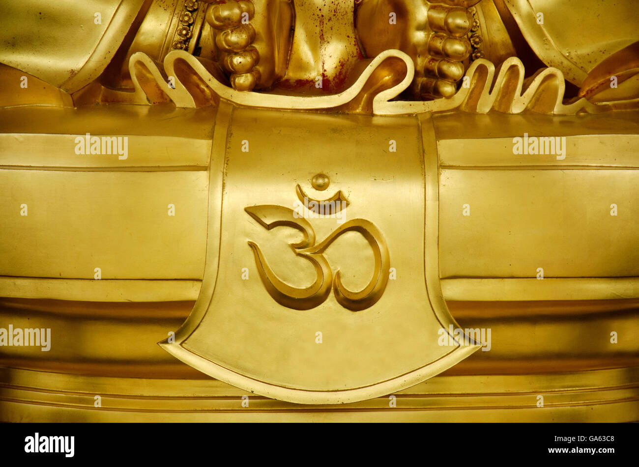 Gold word of hindu reading Om or Aum symbol in Devanagari is a sacred ...
