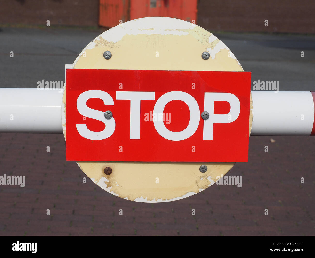 Warning signs, Stop traffic sign in white over red Stock Photo - Alamy