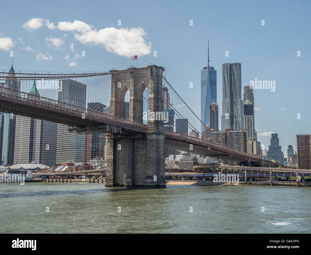 Brooklyn Bridge is a hybrid cable-stayed/suspension bridge in New York ...