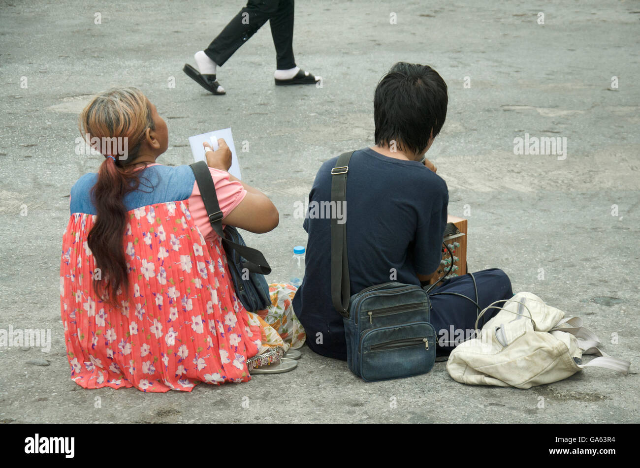 Two beggar begging money from thai people and traveller at Sampeng ...