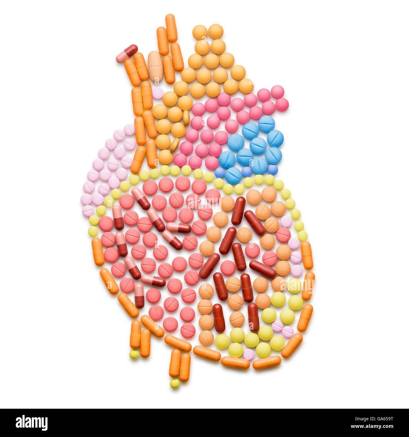 Human heart shape of pills, isolated on white Stock Photo - Alamy