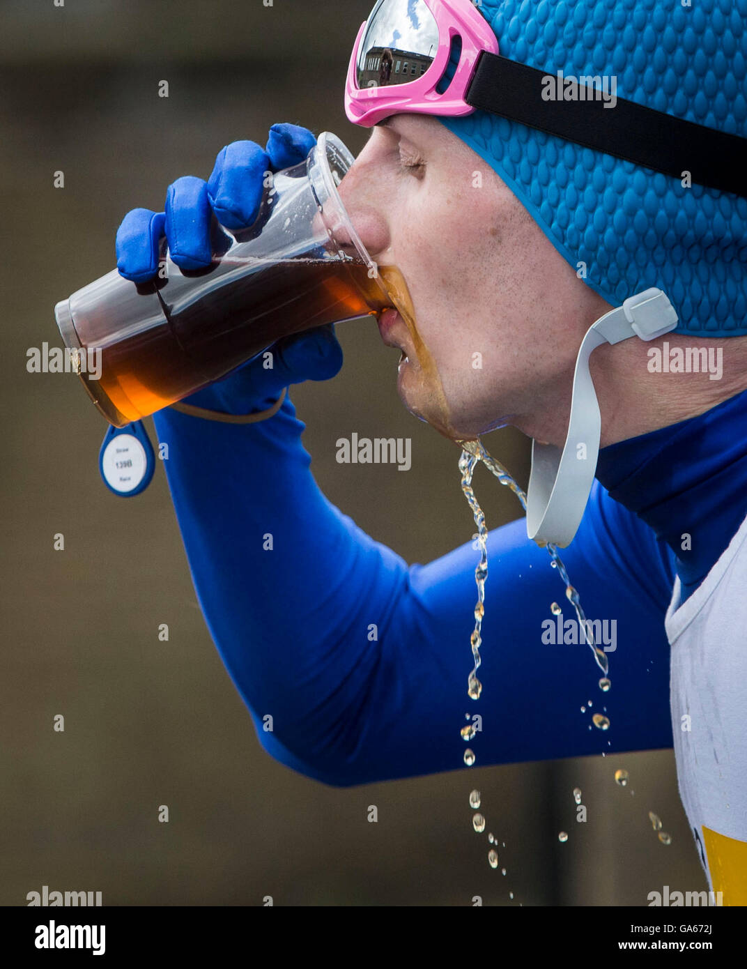 A competitor takes part on the Oxenhope Straw Race in Yorkshire, which ...