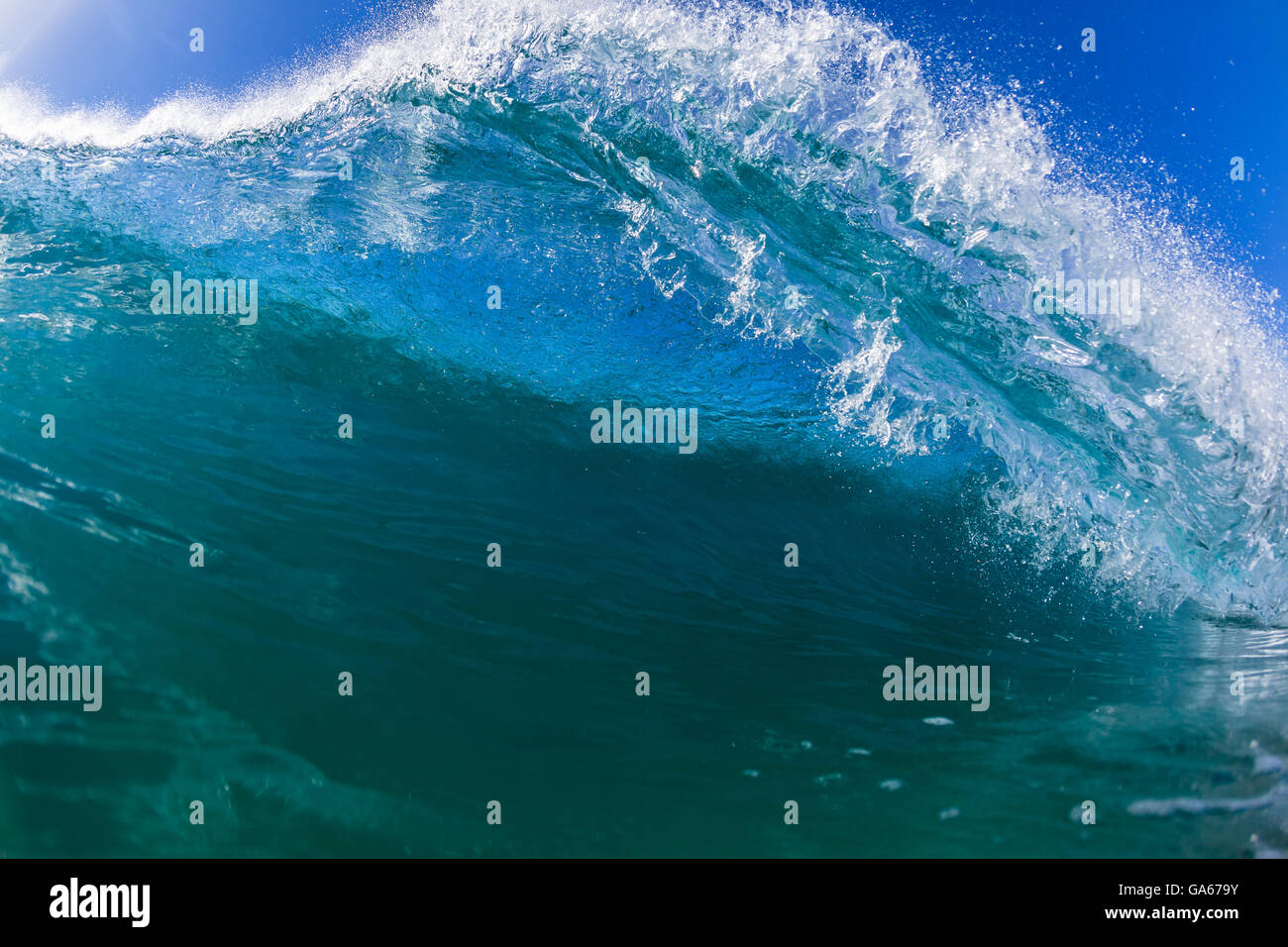 Blue ocean wave swimming inside closeup encounter face to face of ...