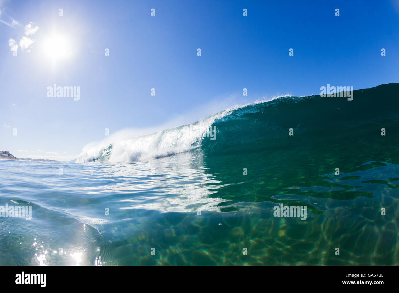 Blue ocean wave swimming inside closeup encounter face to face of ...