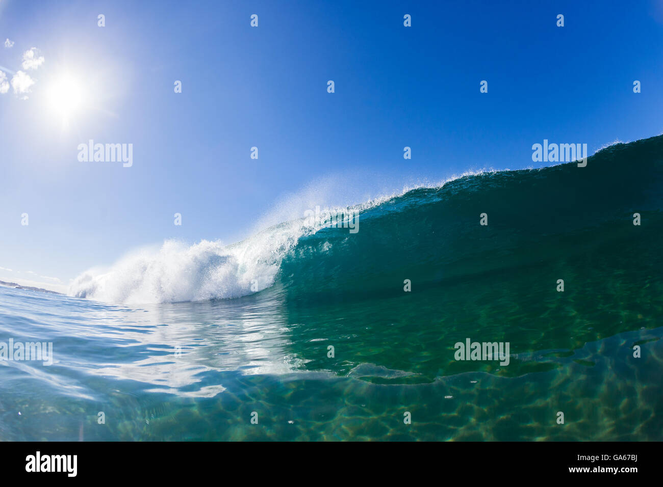 Blue ocean wave swimming inside closeup encounter face to face of ...