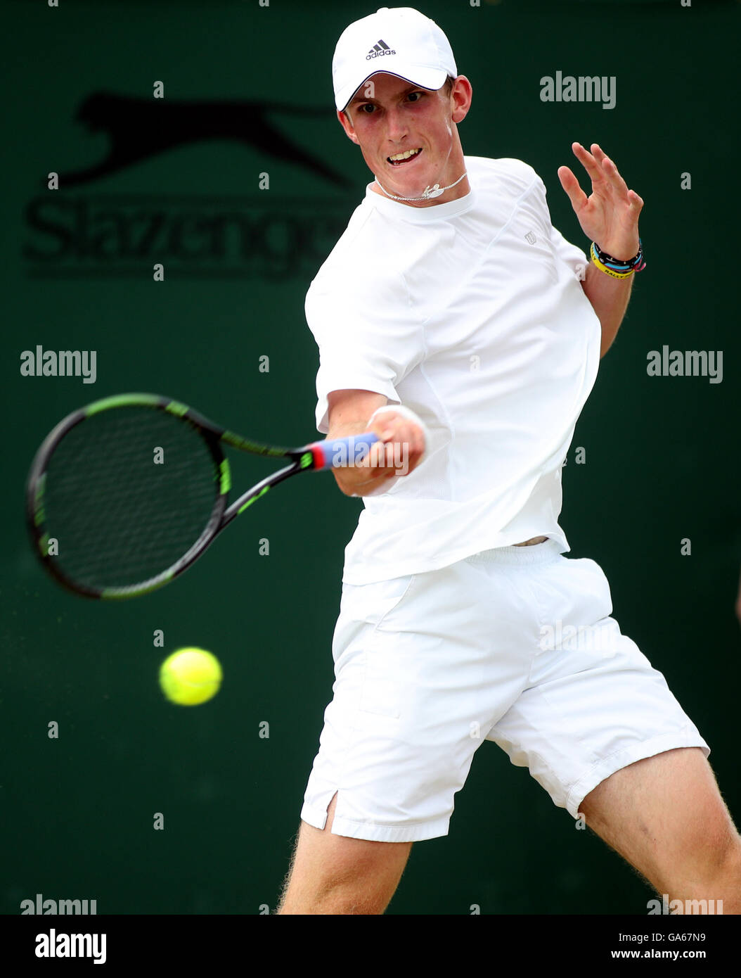 Luke Hammond in action against Dan Added on day seven of the Wimbledon ...