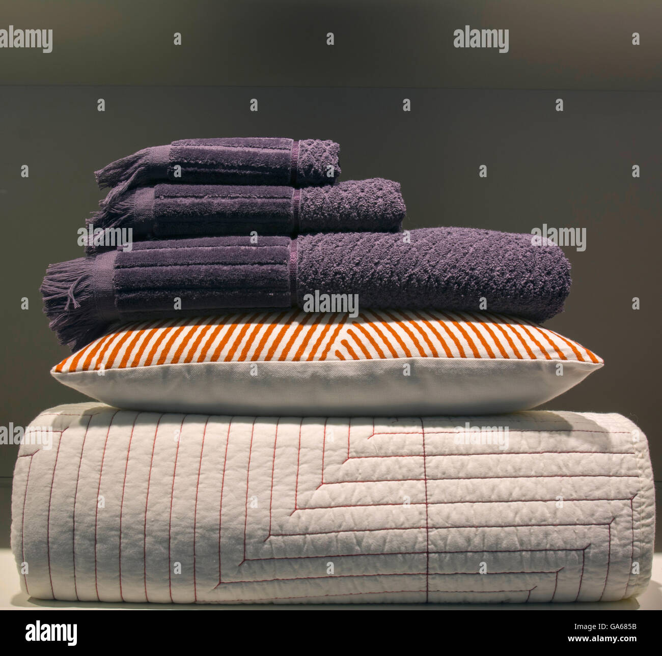 Stacked bed clothes Stock Photo - Alamy