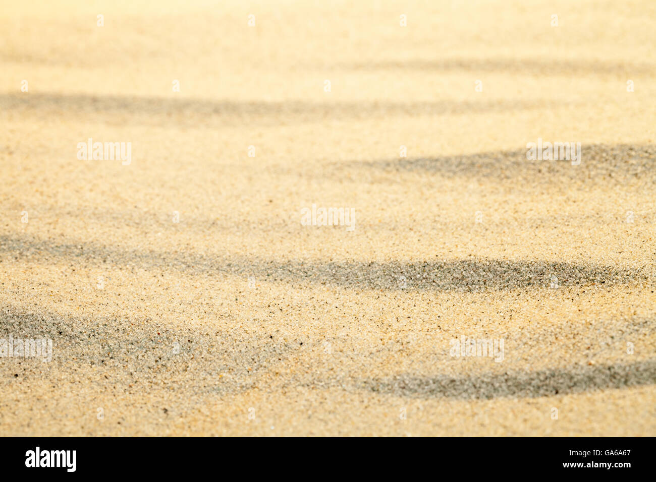Sand on summer beach background, sunset Stock Photo - Alamy