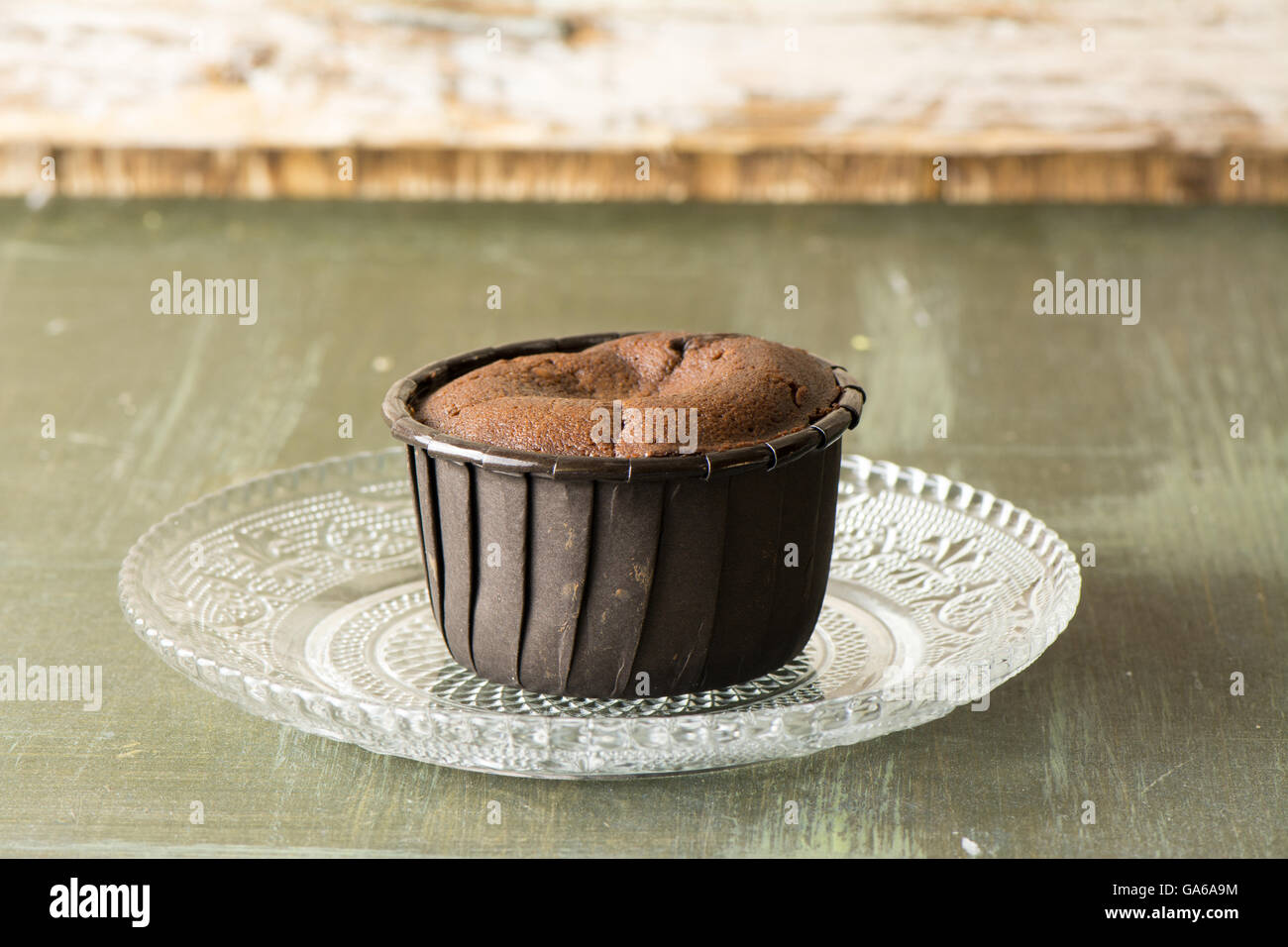 coulant chocolate cake, baked on green wood in a rustic setting Stock ...