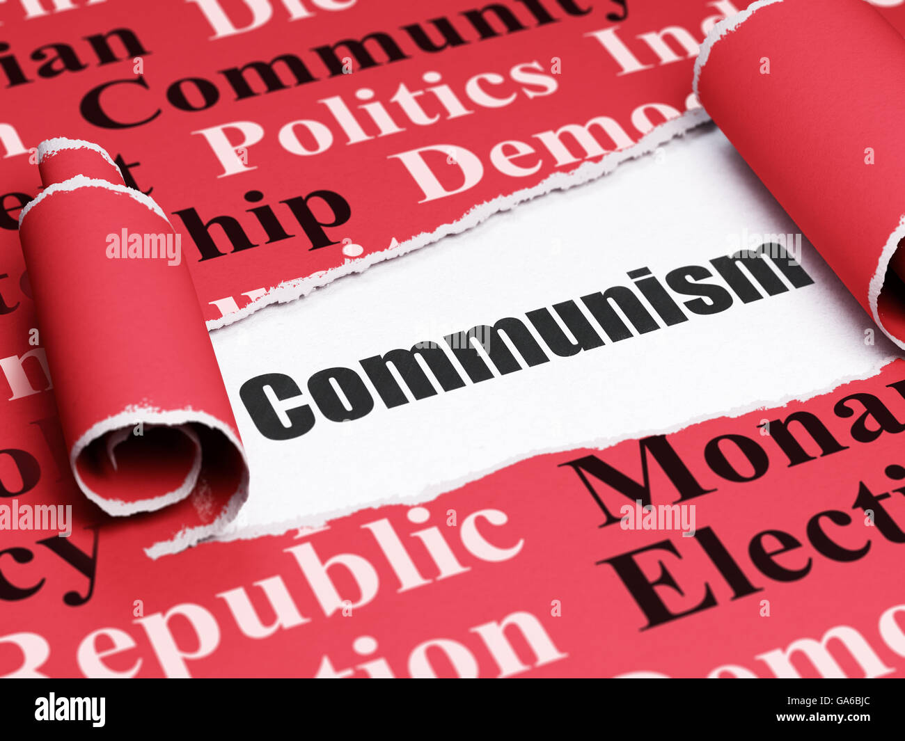Political concept: black text Communism under the piece of torn paper ...