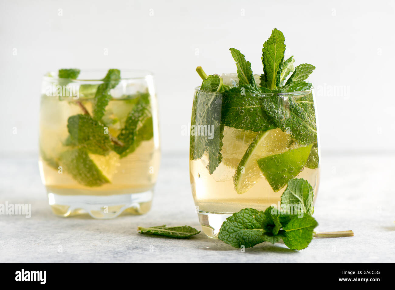 mojito cocktail with rum, lime and soda, garnished with mint Stock ...