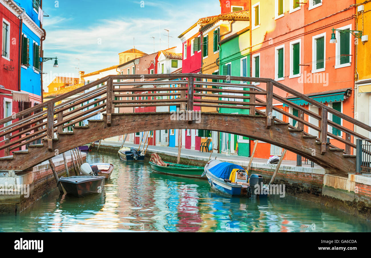 Small wooden bridge over a canal in Burano, Italy Stock Photo - Alamy