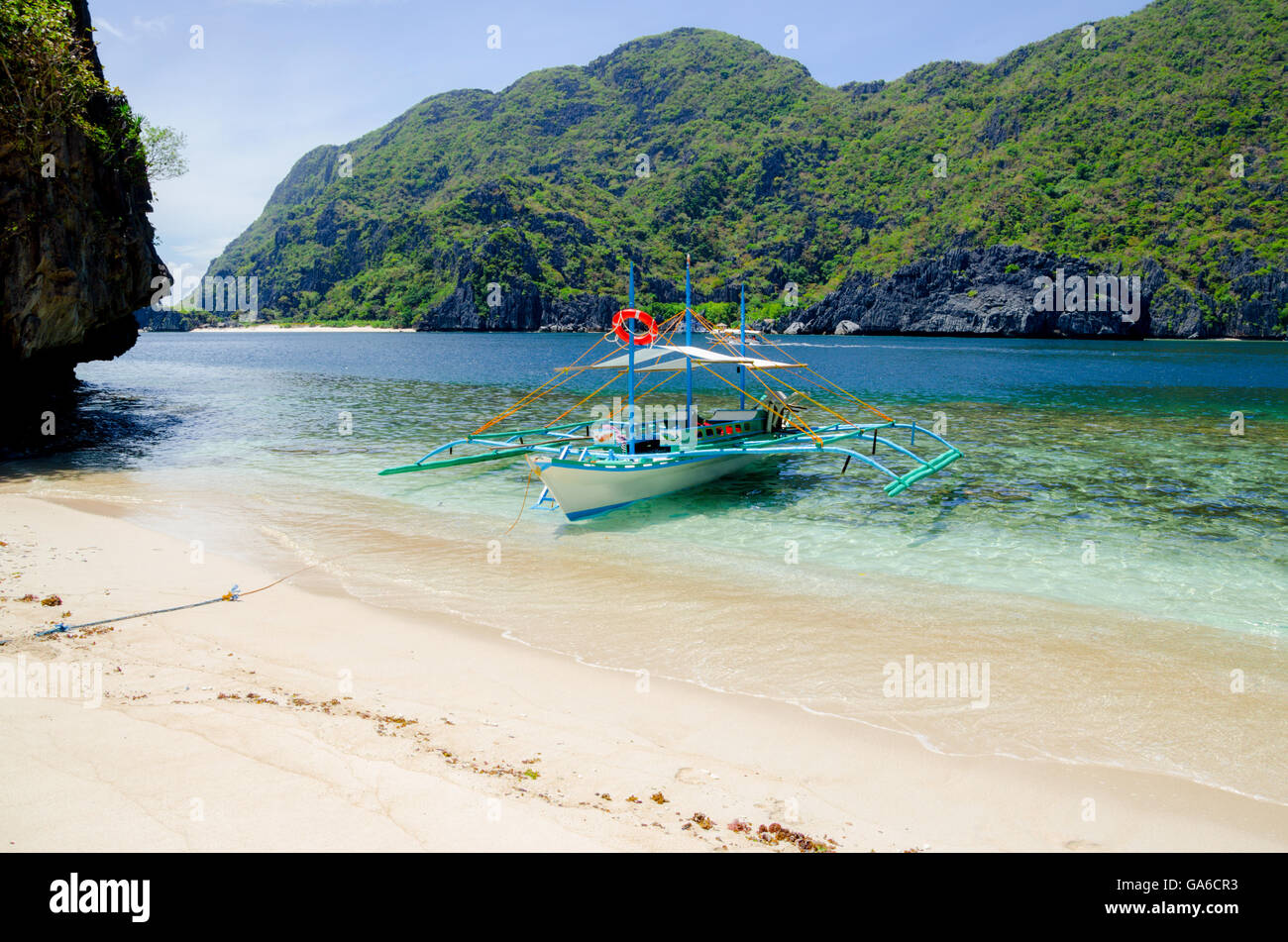 El Nido, Philippines - banca on the beach, Tapiutan island Stock Photo ...