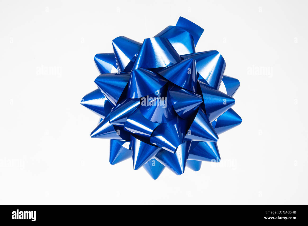 A large Blue bow on a white background Stock Photo - Alamy