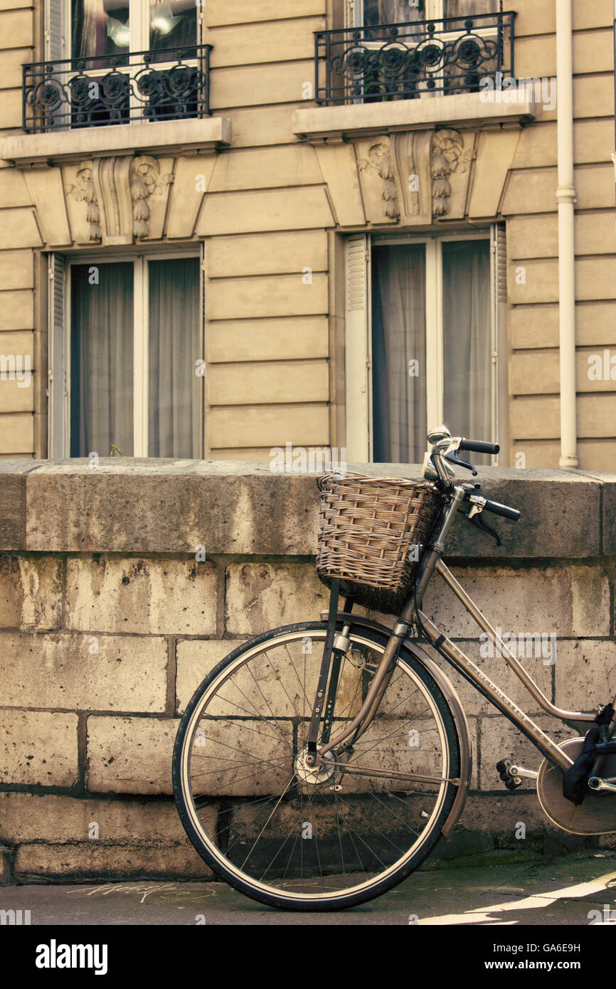 Bicycle in a Paris street Stock Photo - Alamy