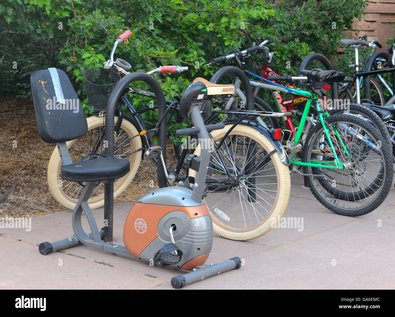 Exercycle locked to bike rack at the Boulder Public Library main branch ...