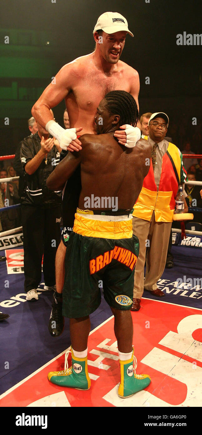 Wales' Enzo Maccarinelli is congratulated by Guyana's Wayne Braithwaite after beating him in the ...