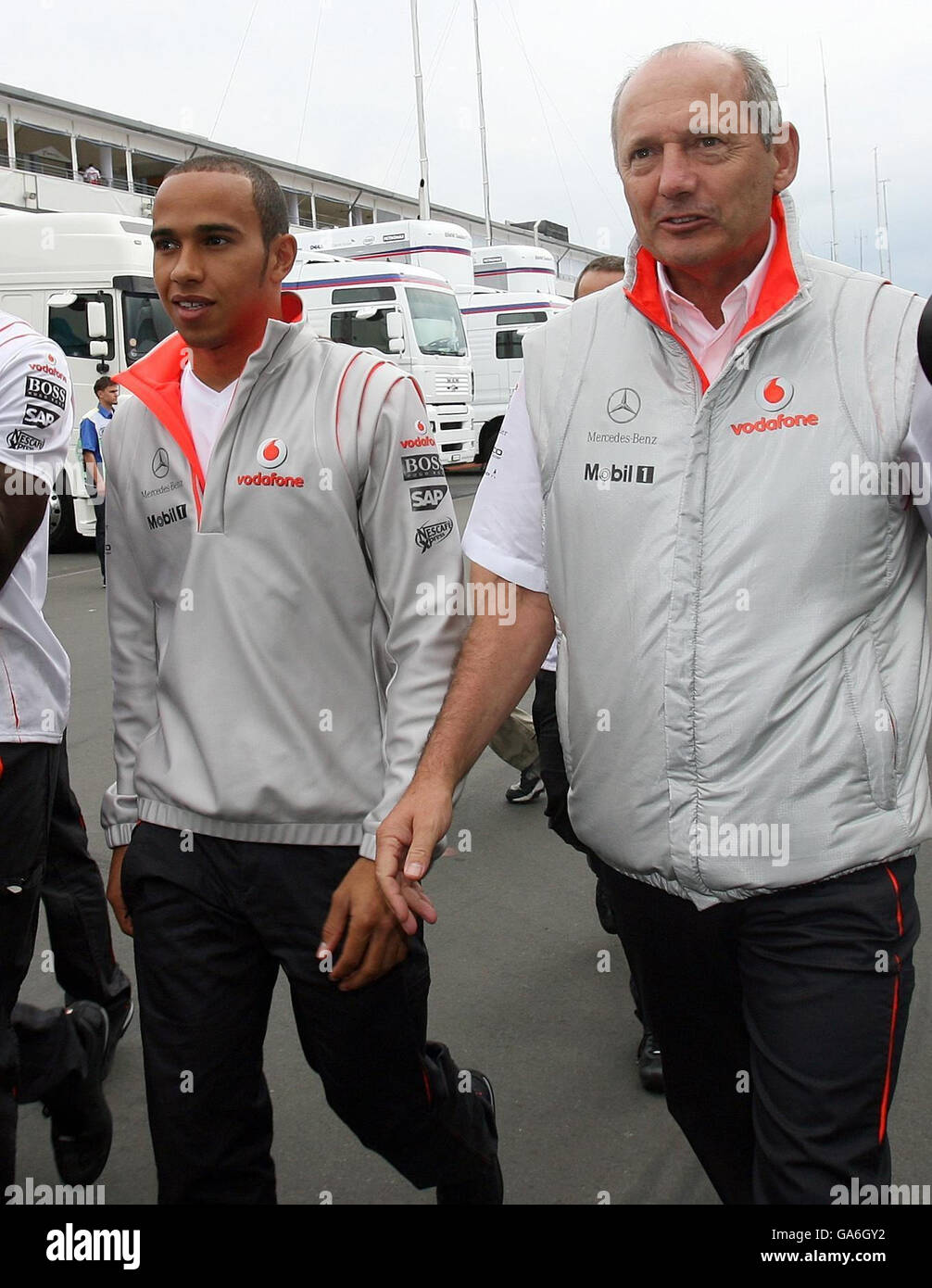 Great Britain's Lewis hamilton arrives back in the paddock with McLaren ...