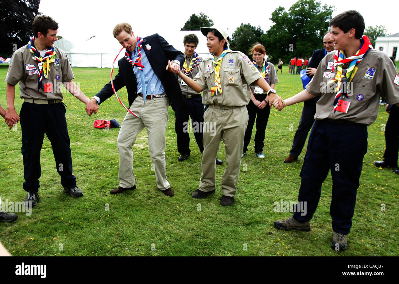 Prince William joins in with traditional scout games during the opening ...