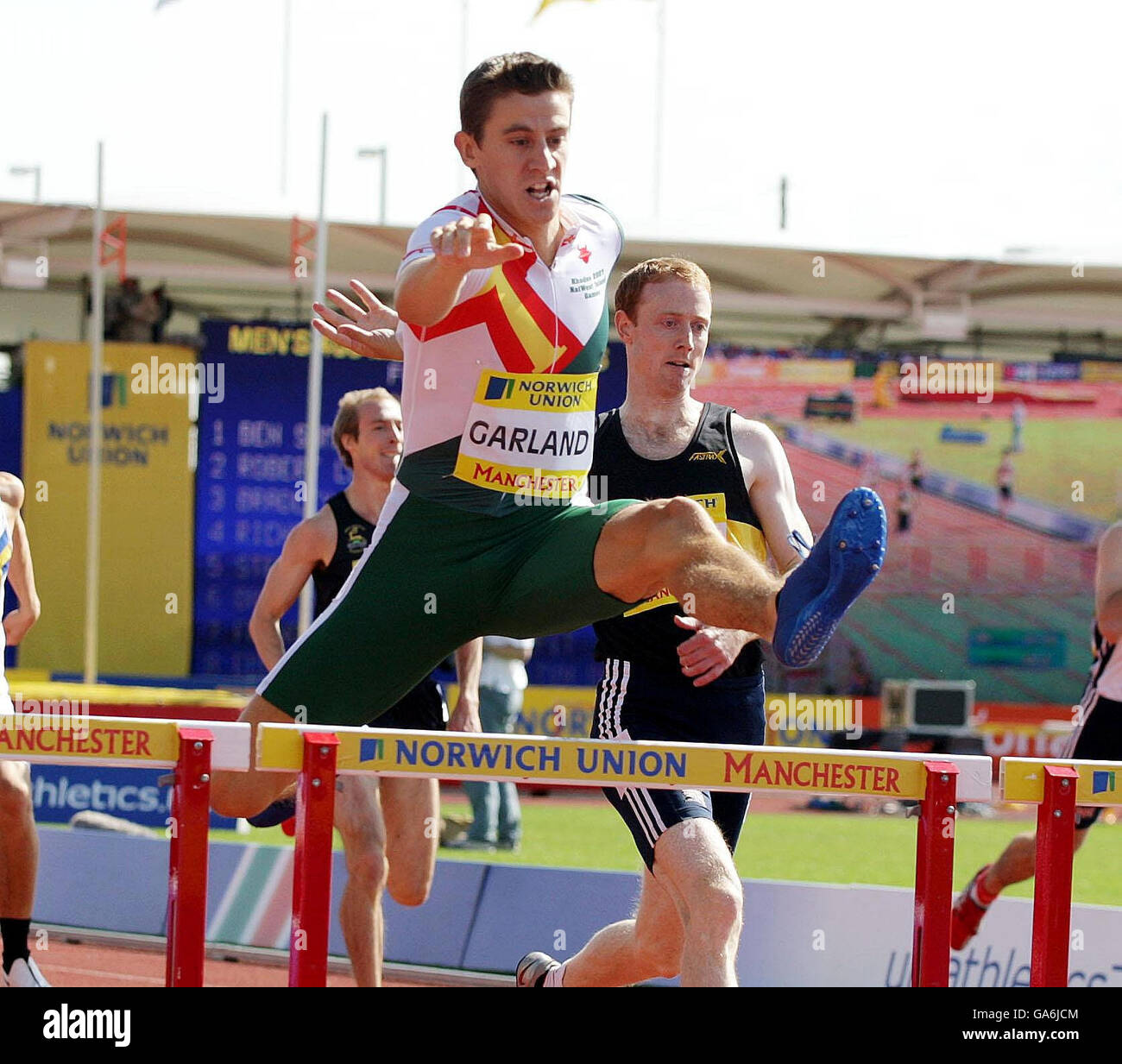 Dale Garland clears the last hurdle to win the mens 400 Metre Hurdles ...