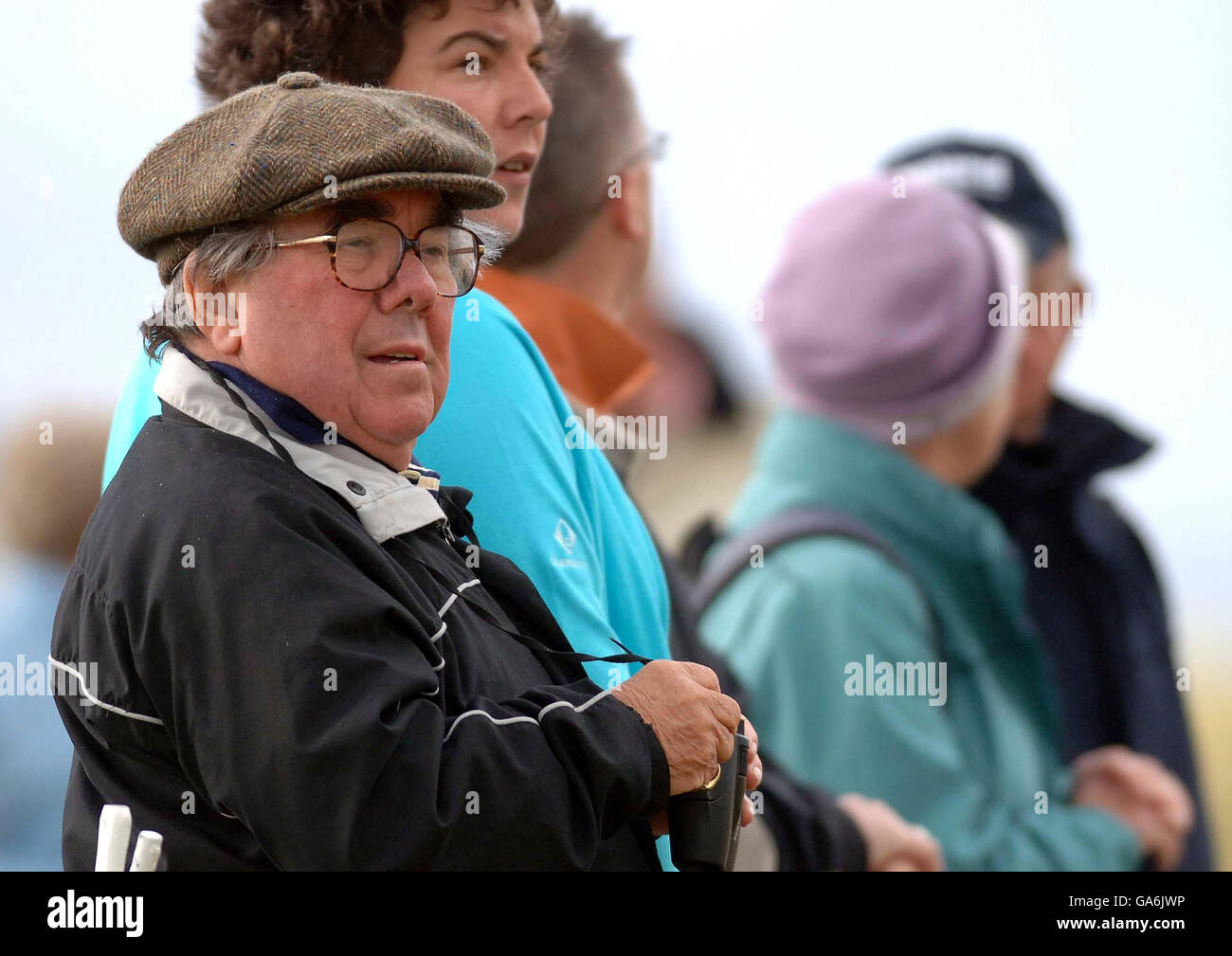 Ronnie corbett watches play during the senior british open championship ...