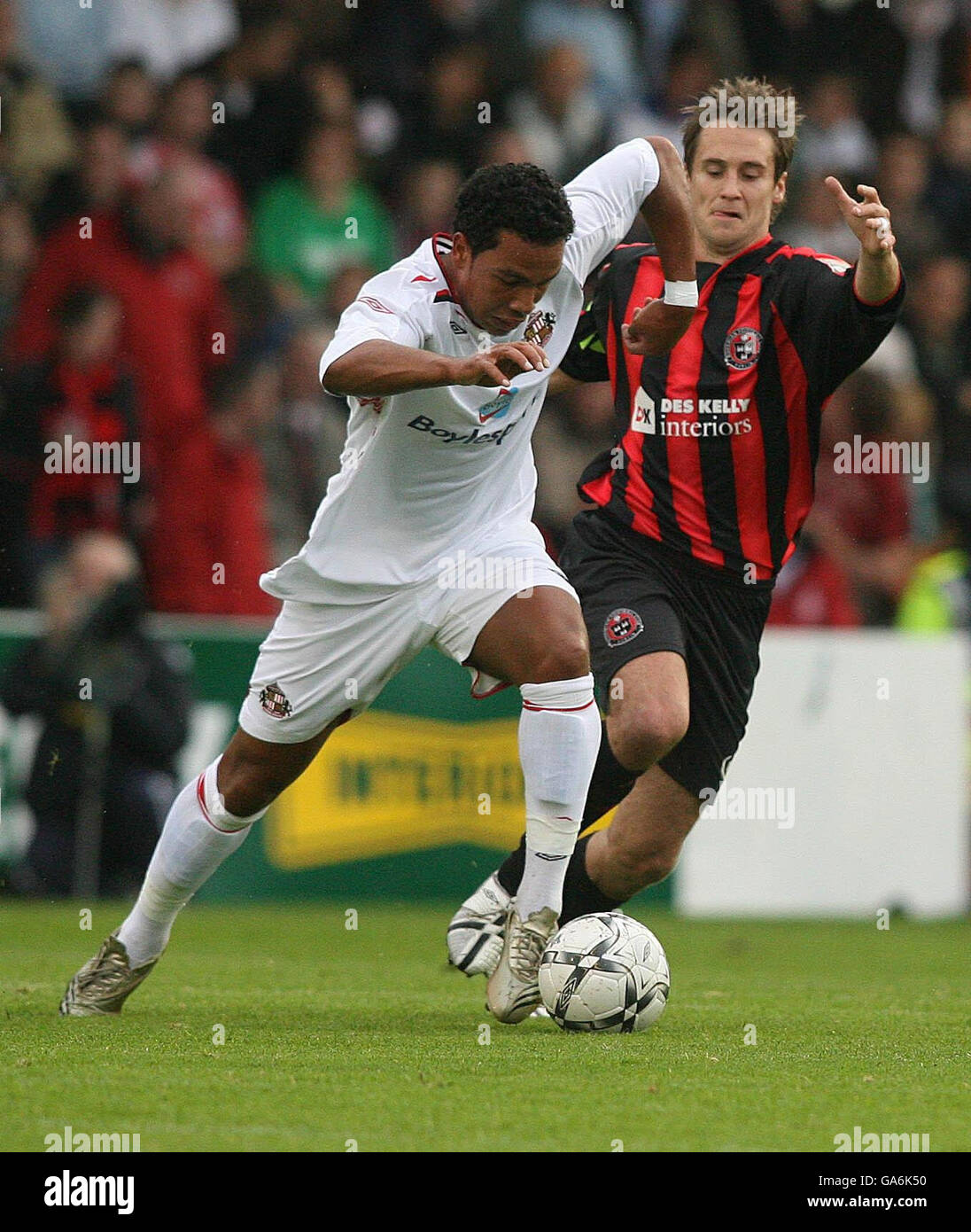 Bohemian's Kevin Hunt (right) tackles Sunderland's Kieran Richardson ...