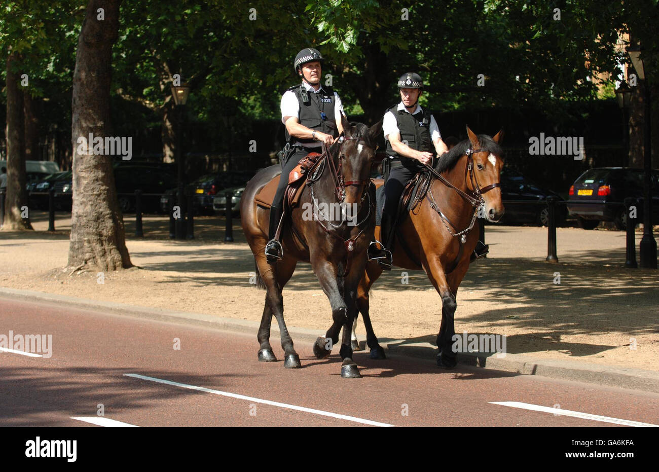 Two police officers on horses patrol the mall hi-res stock photography ...