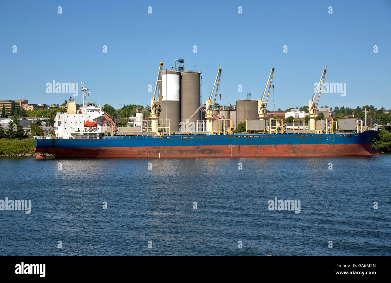 Cargo tanker ship waiting for a grain elevator in Portland Oregon Stock ...