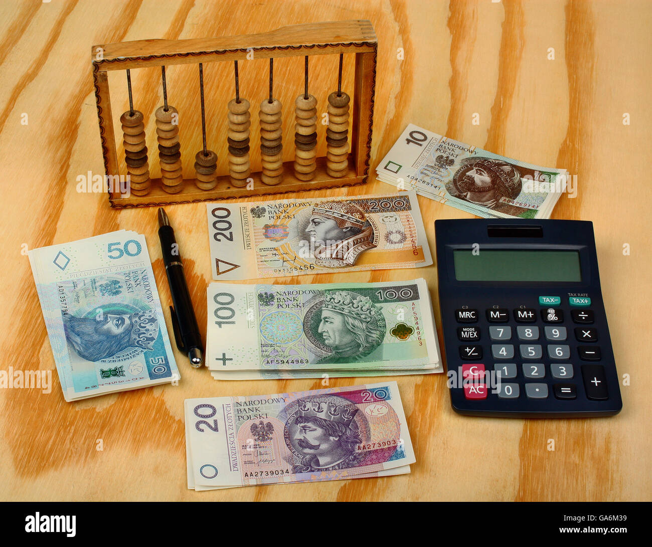 Polish money, calculator, pen, wallet and abacus Stock Photo - Alamy