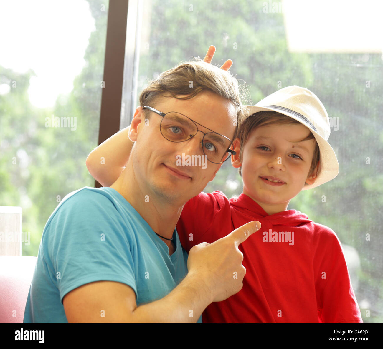 relationship between father and son - family happiness Stock Photo - Alamy