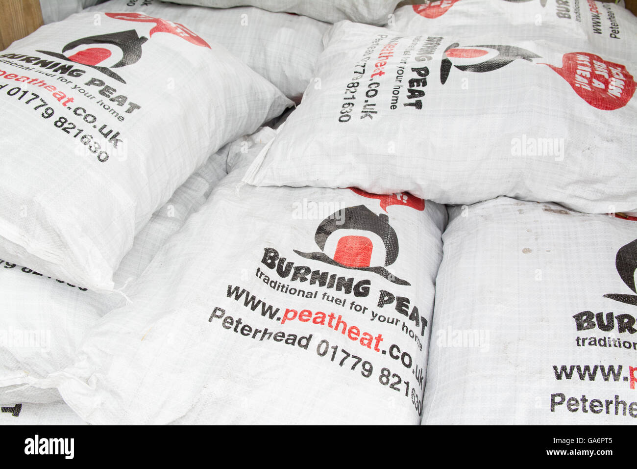 bags of Burning Peat fuel Stock Photo - Alamy