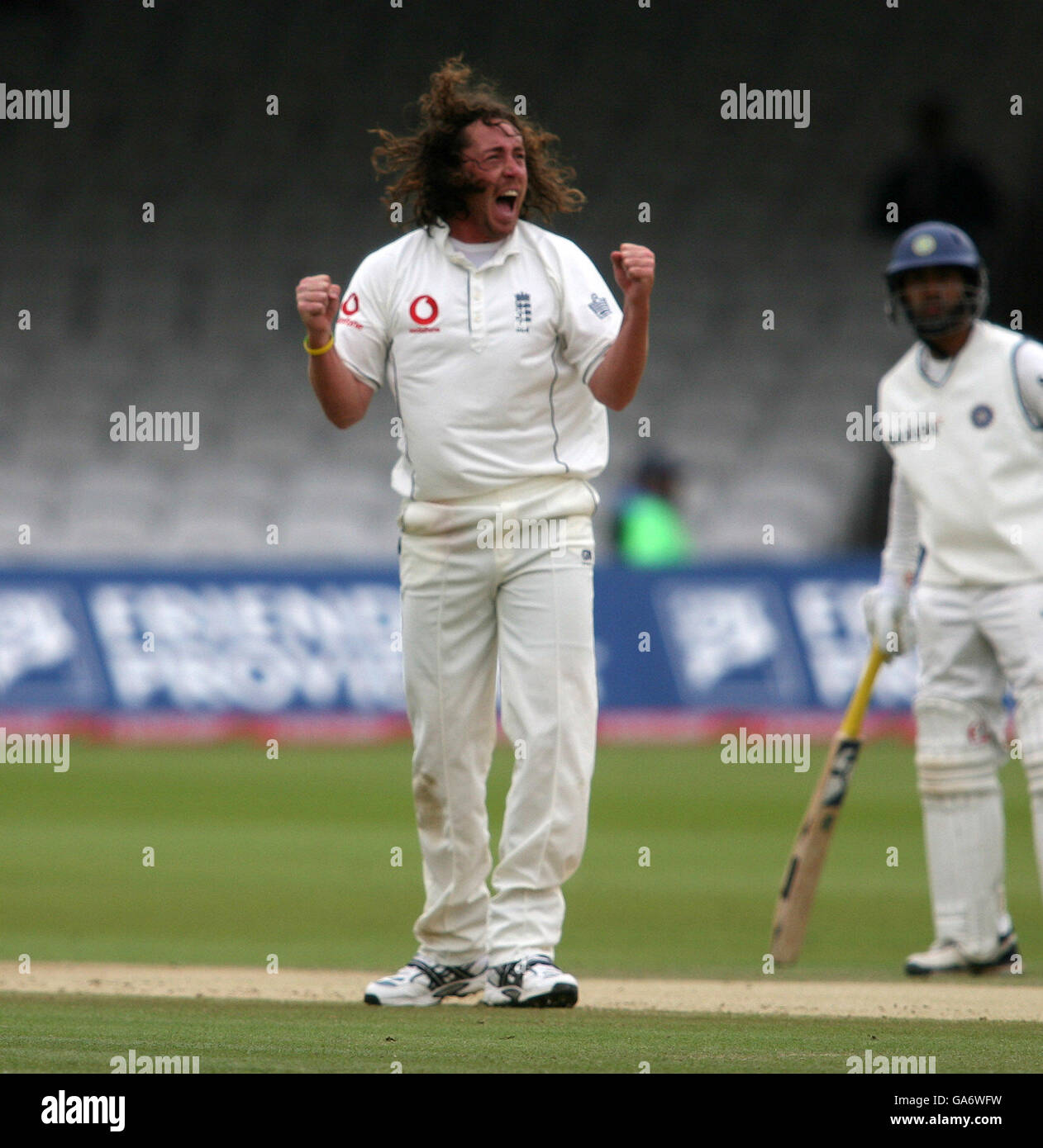 England's Ryan Sidebottom celebrates taking the wicket of India's ...