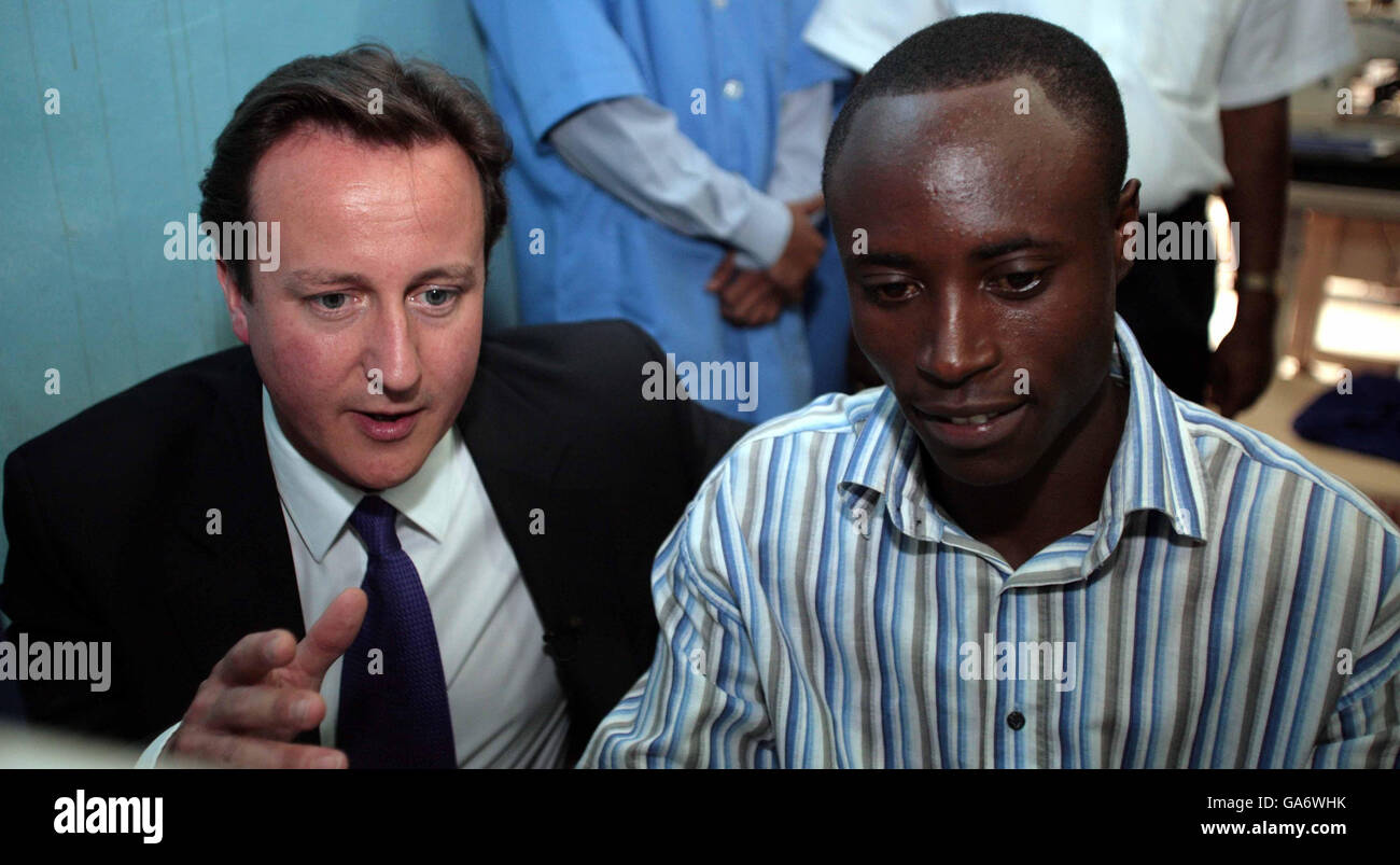 David Cameron, leader of Britain's Conservative Party, meets staff as ...