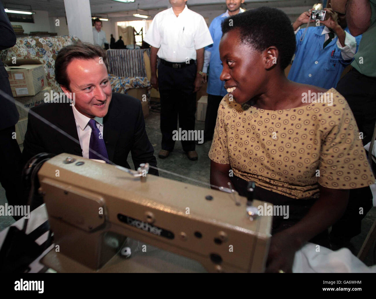 David Cameron, leader of Britain's Conservative Party, meets staff as ...