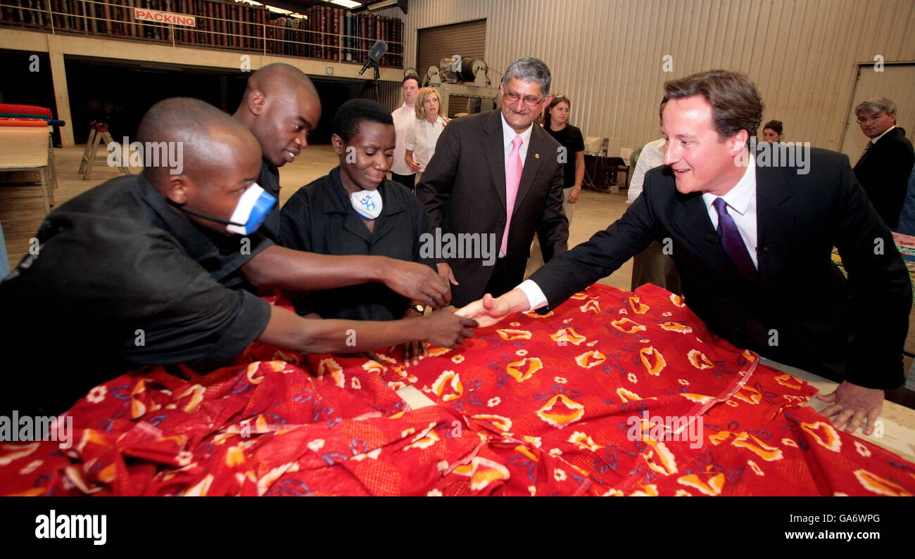 David Cameron, leader of Britain's Conservative Party (right) meets ...