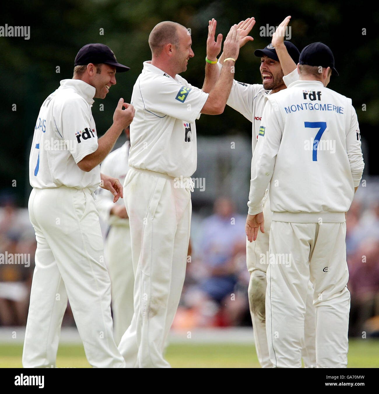 Sussex's Jason Lewry (second from left) celebrates with team-mate Carl ...