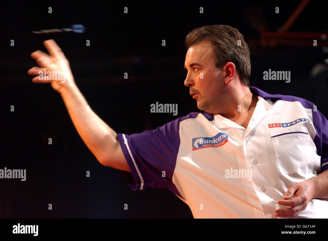 Darts - 2002 Skol World Championships - Purfleet. Phil Taylor shows the ...