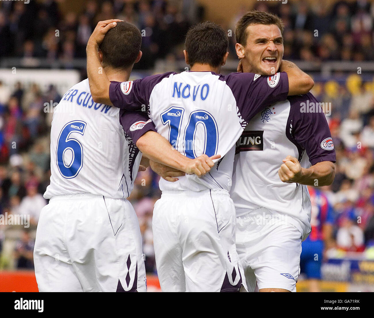 Rangers' Nacho Novo celebrates with team-mate Lee McCulloch (right ...