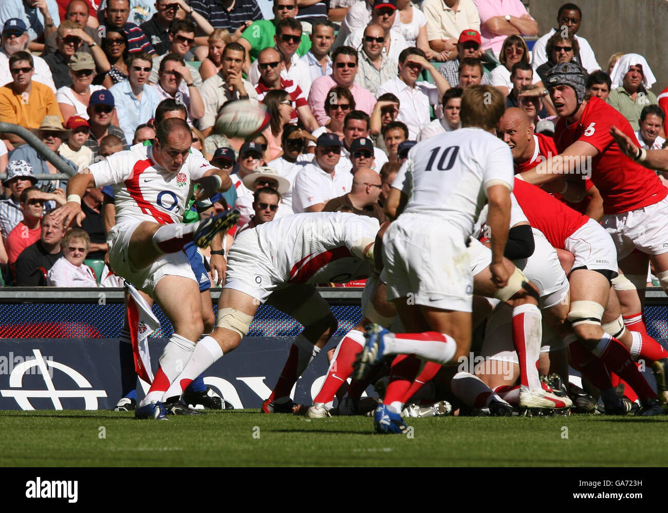 England's scrum half Shaun Perry kicks into touch against Wales during ...