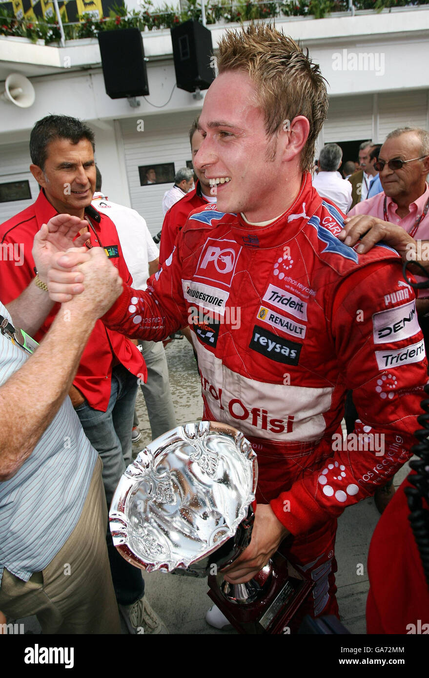 Northern Ireland's Adam Carroll celebrates his second place in the GP2 ...