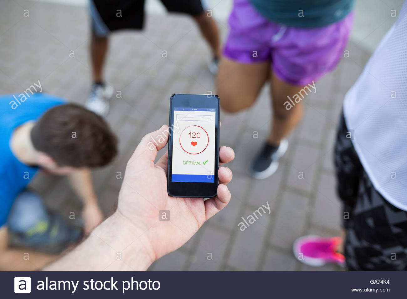 Group checking hi-res stock photography and images - Alamy