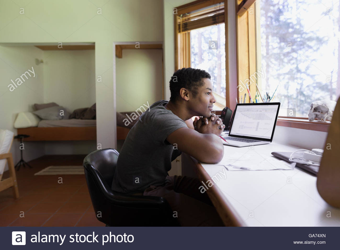 Man desk looking out window hi-res stock photography and images - Alamy
