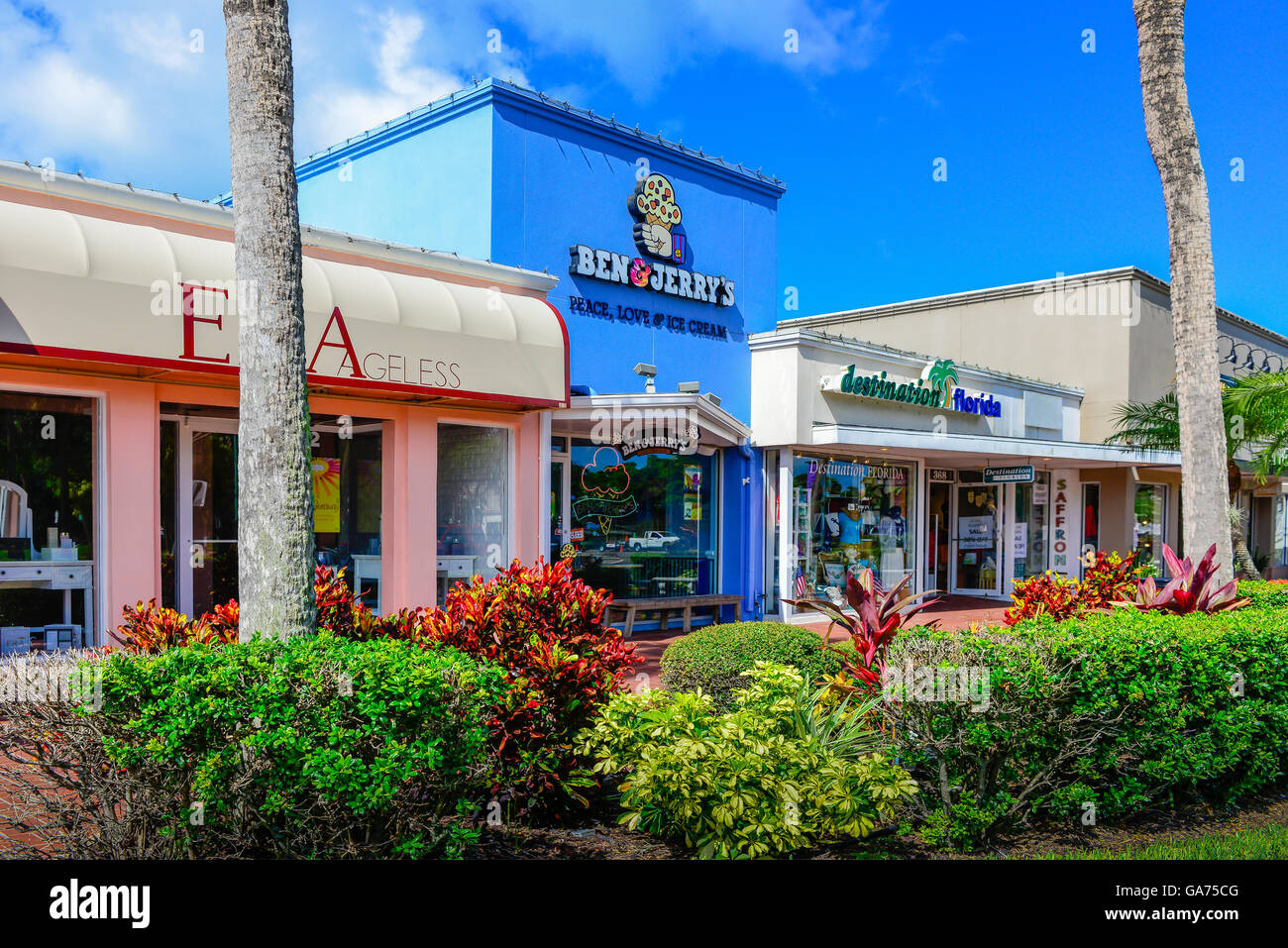 A colorful Ben & Jerry's shop, Peace Love & Ice Cream store with other ...