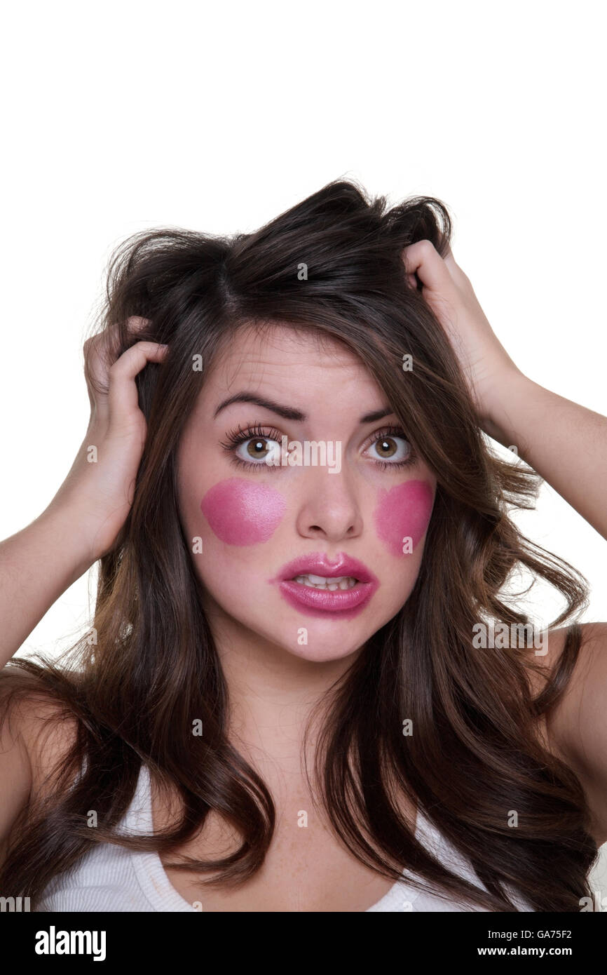 Close up head and shoulders shot of a pretty fashion model having a bad ...