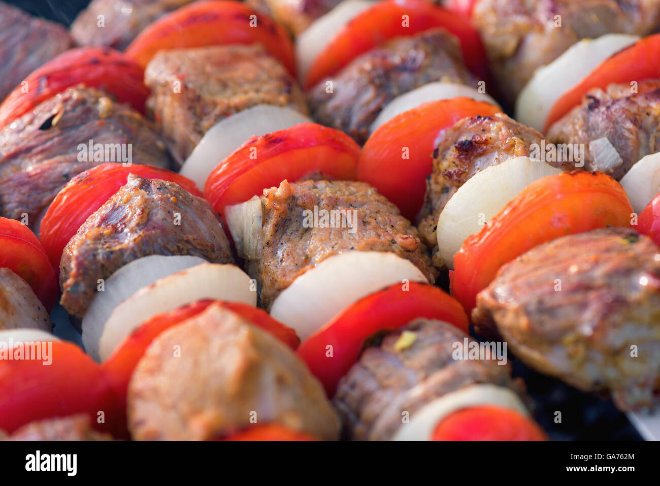 Barbecue with delicious grilled meat Stock Photo - Alamy