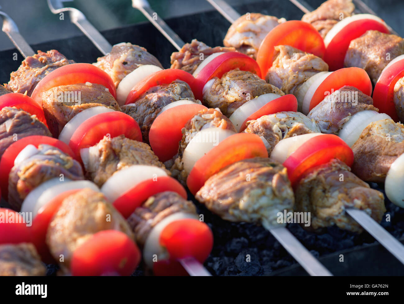 Barbecue with delicious grilled meat Stock Photo - Alamy