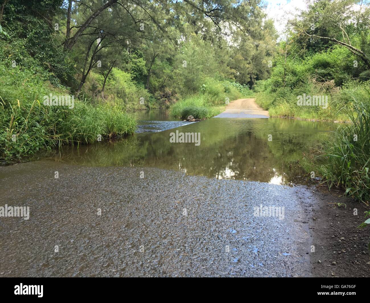 Water Stream over Road Stock Photo - Alamy