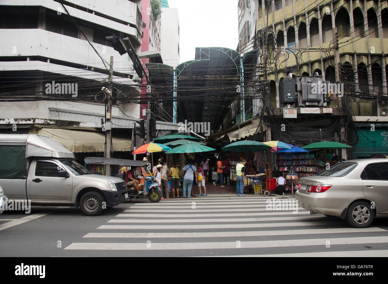 Traffic road and people walking cross over road at crosswalk go to ...