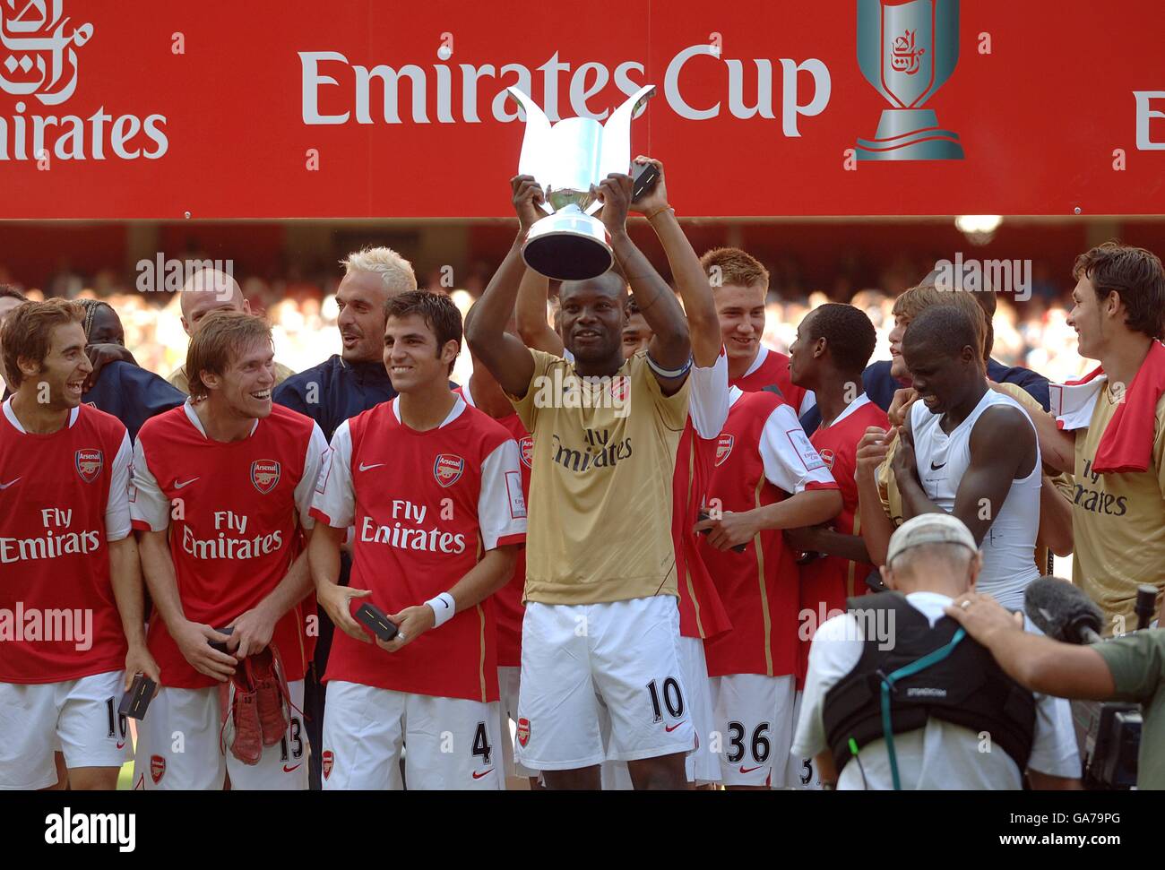 Football team winning trophy hi-res stock photography and images - Alamy